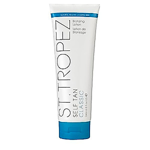 St.Tropez Gradual Tan Classic Daily Firming Lotion, Gradual Sun Kissed Glow Self Tan Moisturizer, 5 Skincare Benefits, Vegan, Natural & Cruelty Free, 8 Fl Oz