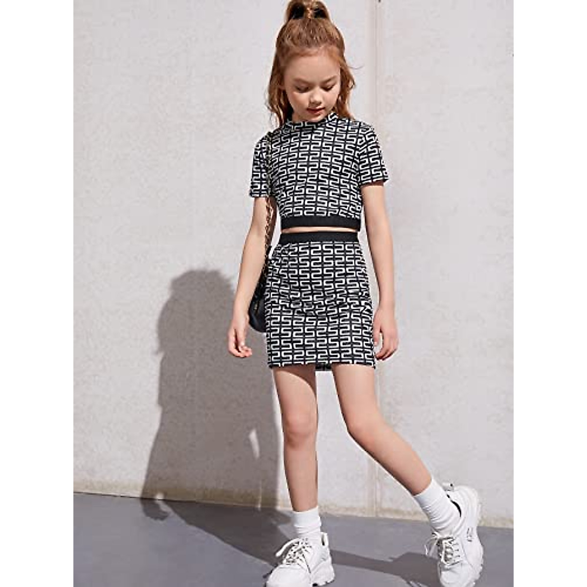 Milumia Girl Two Piece Outfits Geo Print Mock Neck Short Sleeve Tee and Mini Skirt Set Black and White 10 Years
