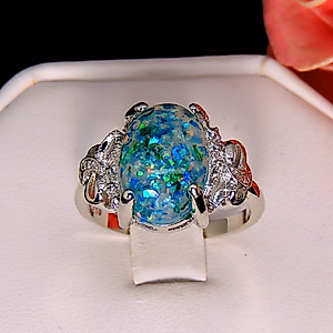 Ginger Lyne Collection Sharla Simulated Fire Pink Purple or Green Opal Ring for Women Oval Shape Fashion Jewelry Statement Ring for Her Size 9