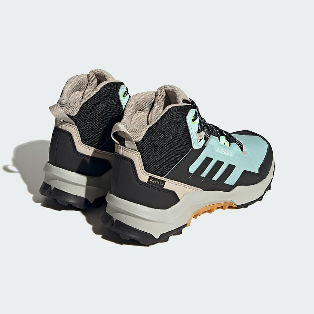 adidas Women's Terrex AX4 Mid Gore-Tex Sneaker, Semi Flash Aqua/Core Black/Preloved Yellow, 11