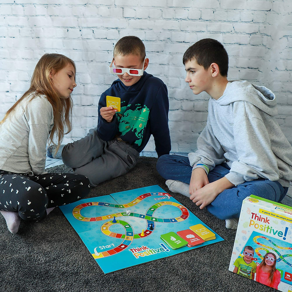 Think Positive a fun Kids Board Game to promote positive thinking in life for ages 6+. Therapy and learning family game with Doing Good, Thinking Positively and Seeing Good cards & rose tinted glasses
