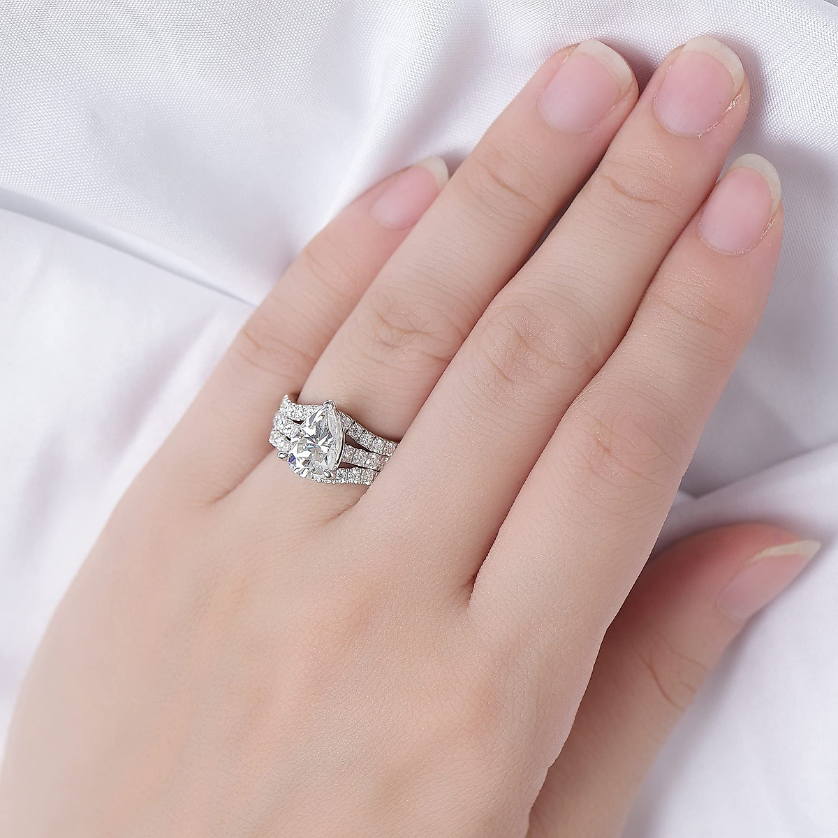 DovEggs Center 4ct 7x11mm G-H-I Color Pear Shaped Moissanite Hidden Halo Engagement Ring Curved Enhancer Guard Wedding Band Bridal Set with accents 14K Gold QUALITY Silver Engagement Ring for Women,