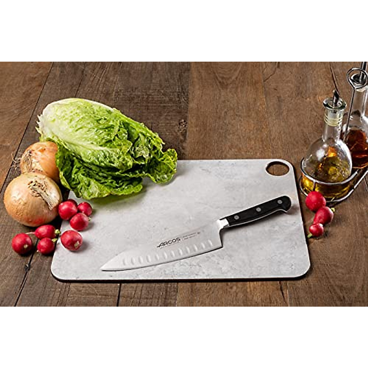 ARCOS Santoku Knife 7 Inch Nitrum Stainless Steel and 190 mm blade. Ergonomic Polyoxymethylene POM Handle.Classical design and rounded finish of great beauty and sturdiness. Series Opera. Color Black.
