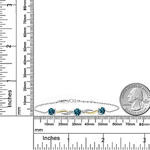 Gem Stone King 925 Silver and 10K Yellow Gold London Blue Topaz and White Lab Grown Diamond Tennis Bracelet For Women (2.14 Cttw, Gemstone Birthstone, 7 Inch, with 1 Inch Extender)