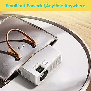 PURSHE Mini Projector 7500L, Full HD 1080P Supported Portable Outdoor Movie Projector for iOS, Android, Windows, Compatible with TV Stick/HDMI/Smartphone/PS4/USB [Remote Control Included]