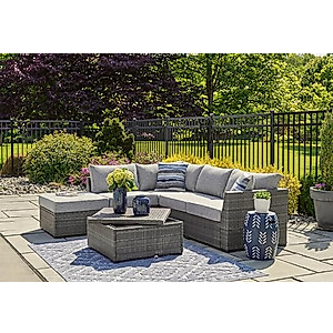 Signature Design by Ashley Petal Road Casual Weather Resistant Cushioned Outdoor Loveseat Sectional/Ottoman/Table Set with 2 Throw Pillows, Set of 4, Gray