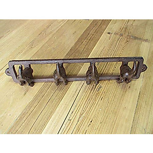 4 Cast Iron Dog Tail Hooks On Rack