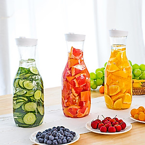 Tomnk 50oz Plastic Pitcher with Lid, Round Carafe Pitcher for Water, Cold Tea, Juice, Milk, Cold Brew, Mimosa Bar and Other Drinks, 2 Pack