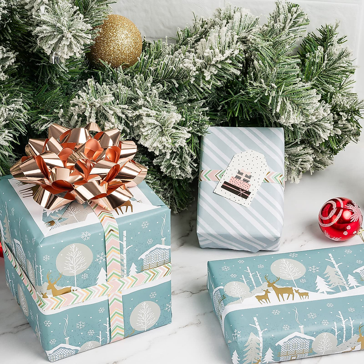 WRAPAHOLIC Reversible Christmas Wrapping Paper - 30 Inch X 100 Feet Jumbo Roll Blue and White Reindeer Family Holiday Landscape and Stripe Design