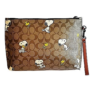COACH Peanuts Carry All Pouch With Snoopy Woodstock Print