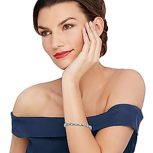 Ross-Simons 17.00 ct. t.w. Oval Swiss Blue Topaz Bracelet in 14kt Yellow Gold. 7.25 inches