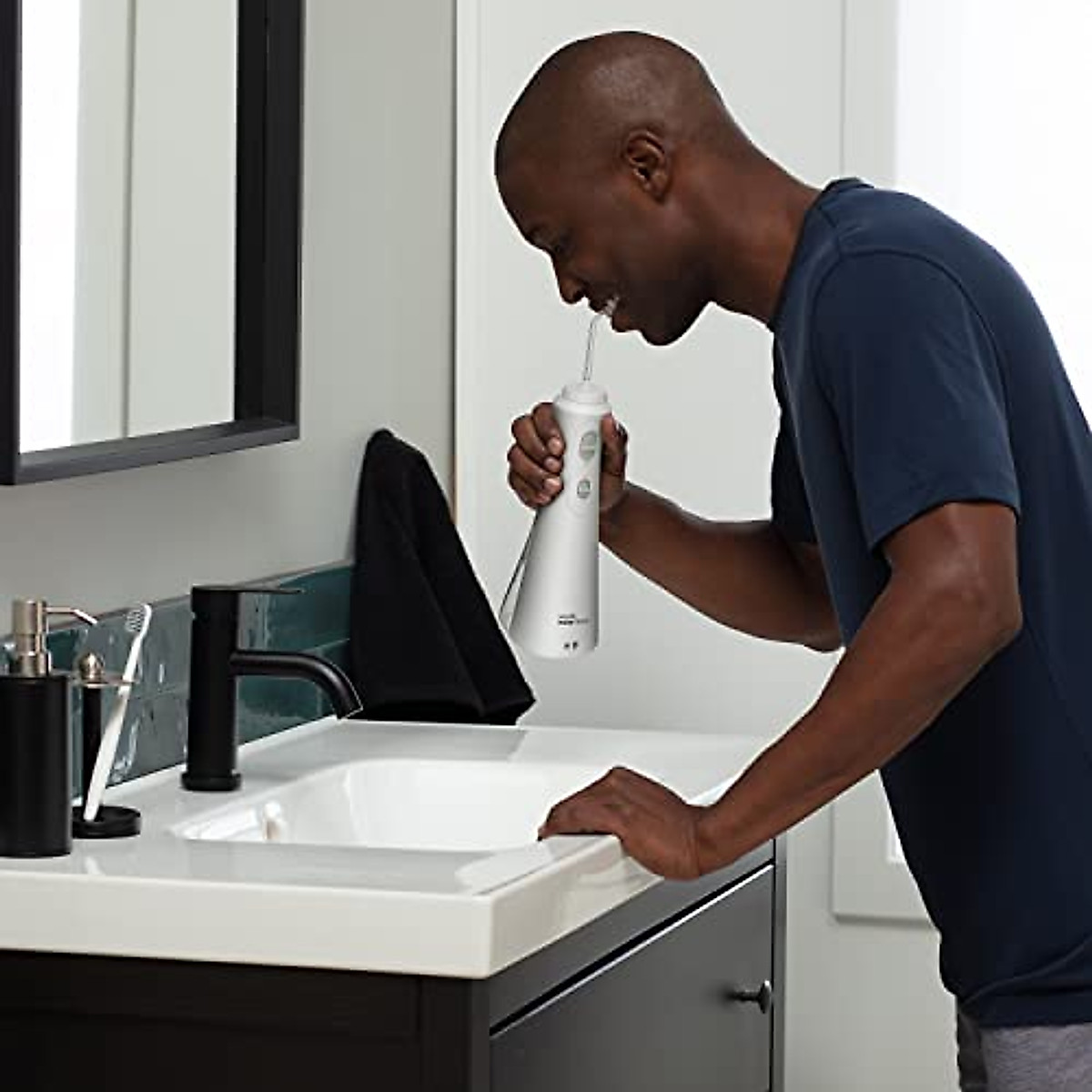 Waterpik Cordless Plus Water Flosser with 4 Flossing Tips, Rechargeable and Portable for Travel and Home, ADA Accepted, White WP-450