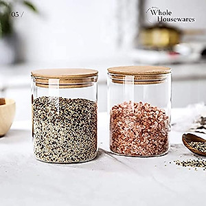 WHOLE HOUSEWARES 24 oz Clear Canister Set with Beech Wood Lids | 2 pcs Food Storage Canister for Kitchen & Pantry Organization and Storage | Ideal for Grains, Sugar, Spices & Herbs