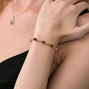 Gem Stone King 18K Yellow Gold Plated Silver Red Garnet and White Lab Grown Diamond Tennis Bracelet For Women (4.37 Cttw, Gemstone January Birthstone, Oval 7x5MM, Fully Adjustable Up to 9 Inch)