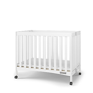 Child Craft London Mini Compact Folding Portable Crib with 2” Crib Mattress and 2 Easy Roll Locking Wheels, Durable Pine Wood Construction (Matte White)