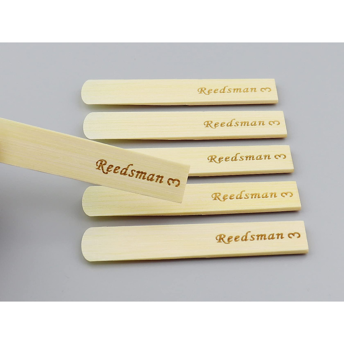 Reedsman Traditional Bb Clarinet Reeds, Includes 10 Plus 2 Total 12 Pack Reeds With Individual Reed Holders and One Mini Harmonica. (Strength 3.0)