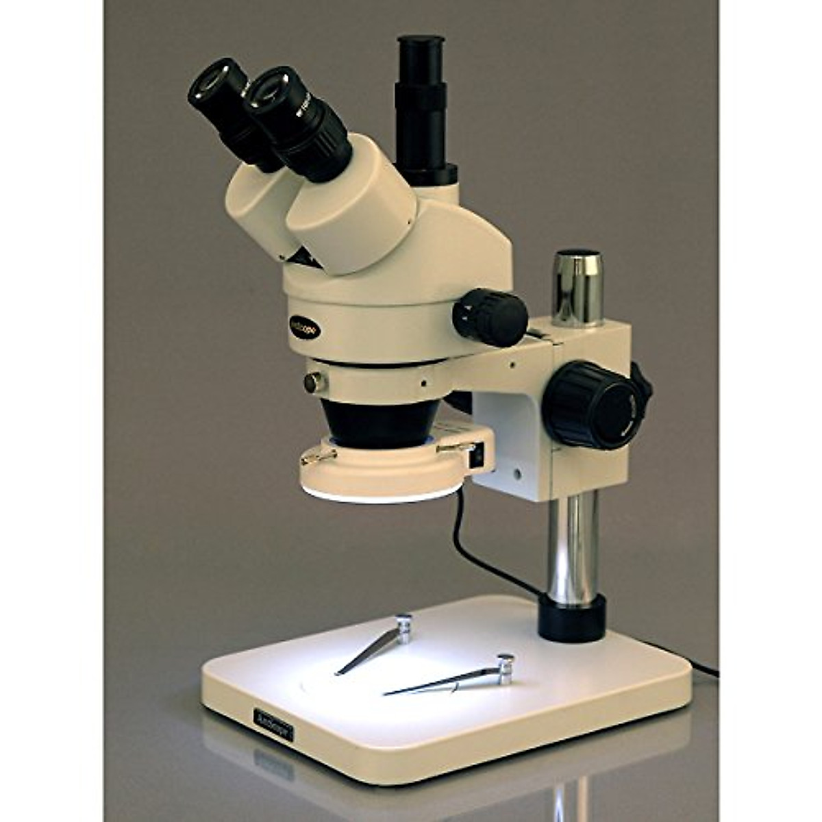 AmScope SM-1TS-144S-M Digital Professional Trinocular Stereo Zoom Microscope, WH10x Eyepieces, 7X-45X Magnification, 0.7X-4.5X Zoom Objective, 144-Bulb LED Ring Light, Pillar Stand, 110V-240V, Includes 1.3MP Camera with Reduction Lens and Software
