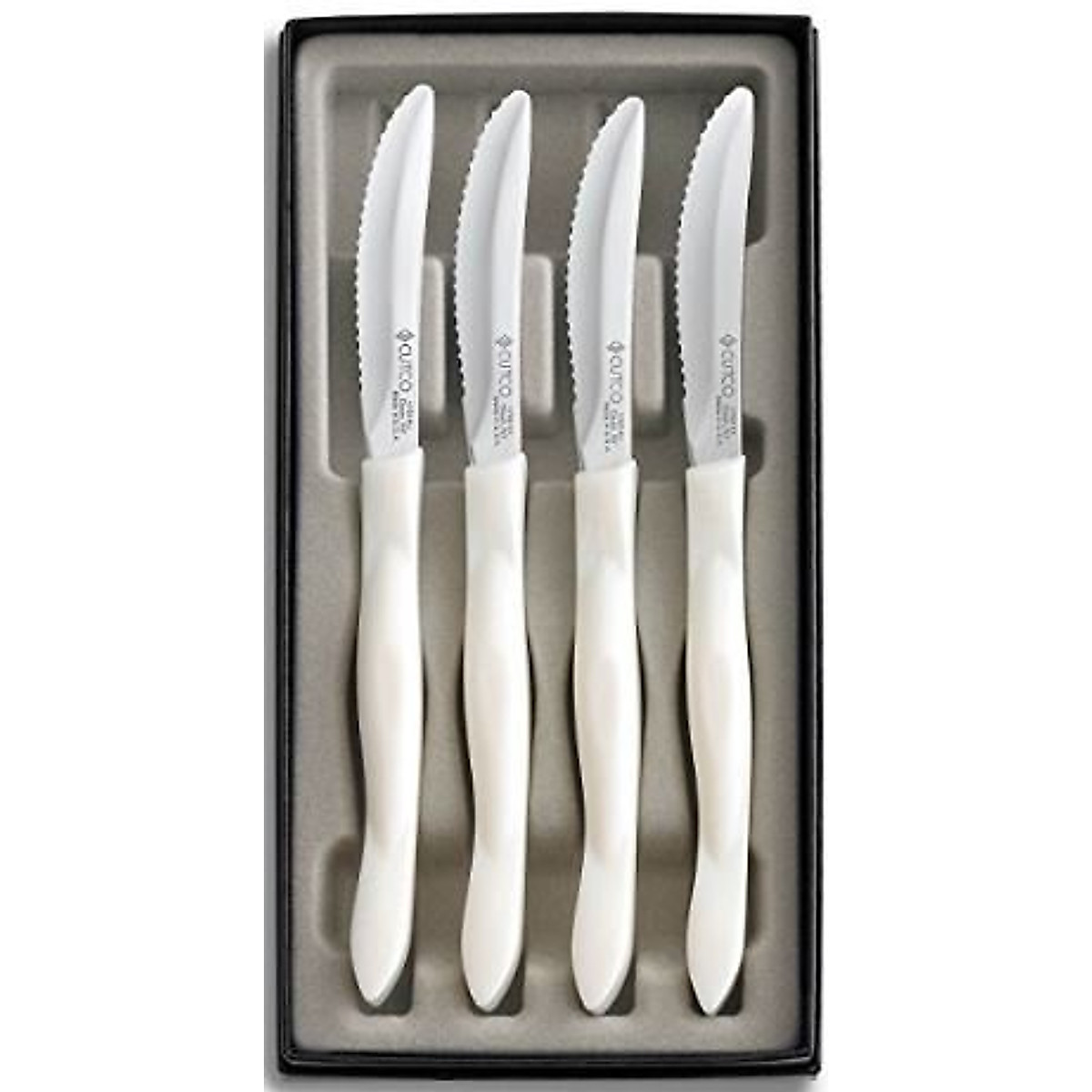 CUTCO #1865 set of 4 White (Pearl) Model 1759 Table Knives, each in a factory sealed plastic bag, inside attractive blue CUTCO box..............3.8" Double-D® serrated 440A High-Carbon, Stainless Steel blades and 5" handles