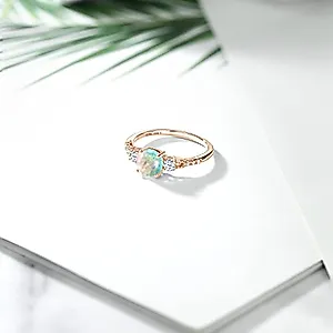 Gem Stone King 10K Rose Gold 6MM Round Gemstone Birthstone White Created Sapphire and White Diamond Accent 3-Stone Engagement Ring | Three-Stone Wedding Anniversary Promise Ring For Women