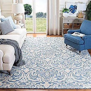 SAFAVIEH Micro-Loop Collection Area Rug - 8' x 10', Blue & Ivory, Handmade Wool, Ideal for High Traffic Areas in Living Room, Bedroom (MLP532M)