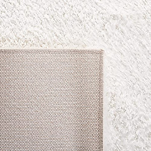 Safavieh Tahoe Shag Collection 9' x 12' White THO670A Solid Non-Shedding 1.2-inch Thick Area Rug