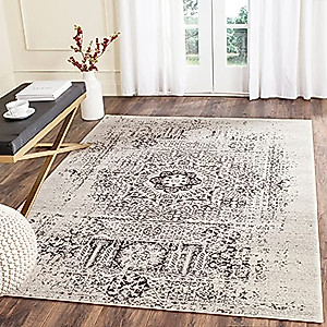 SAFAVIEH Evoke Collection Area Rug - 8' x 10', Ivory & Black, Oriental Medallion Distressed Design, Non-Shedding & Easy Care, Ideal for High Traffic Areas in Living Room, Bedroom (EVK260T)