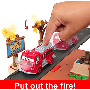 Mattel Disney and Pixar Cars On The Road Toys, Red’s Fire Station Playset with Die-cast Fire Truck & Kid-Activated Action