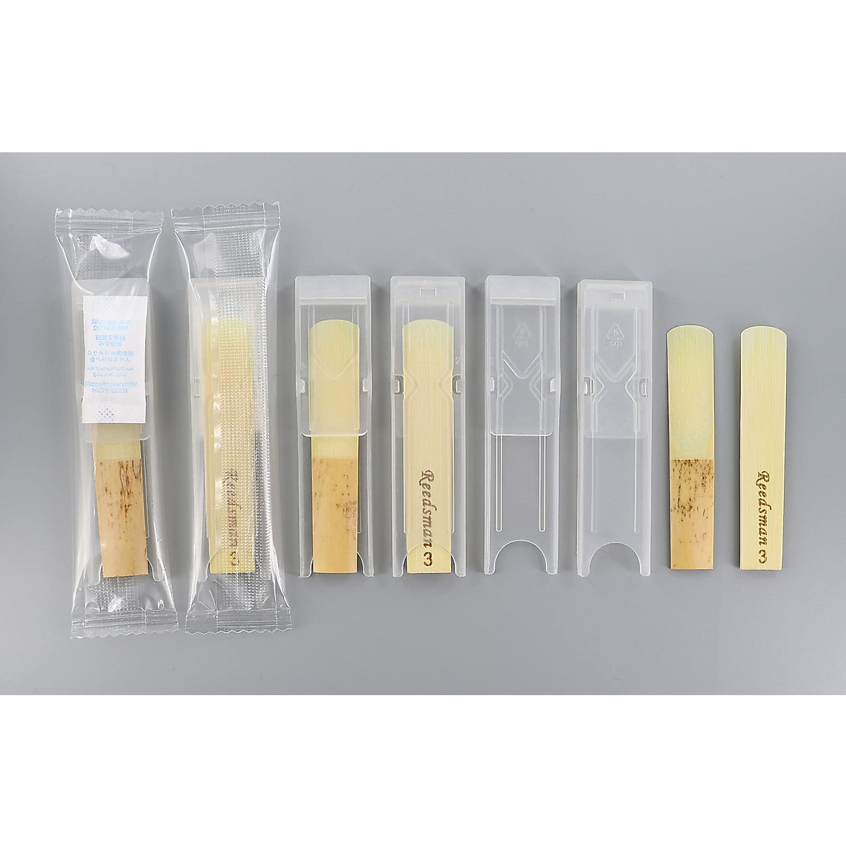 Reedsman Traditional Bb Clarinet Reeds, Includes 10 Plus 2 Total 12 Pack Reeds With Individual Reed Holders and One Mini Harmonica. (Strength 3.0)