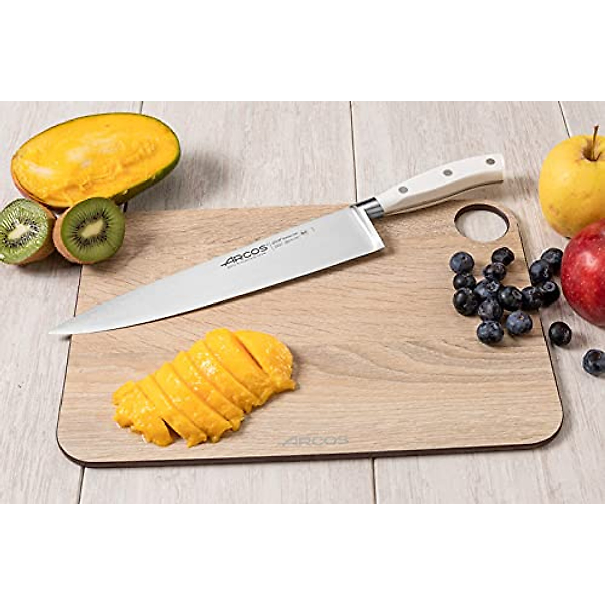 ARCOS Forged Chef Knife 10 Inch Stainless Steel. Professional Cooking Knife For Cutting Variety of Foods. Ergonomic Polyoxymethylene Handle and 250mm Blade. Series Riviera Blanc. Color White