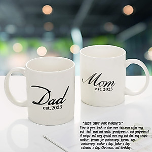 Pregnancy Gifts for First Time Moms – Mom and Dad Est 2023 11 oz Mug Set with Romper (0-3 Months) and Baby Socks ​- Top New Parents Gifts for Mom and Dad to Be