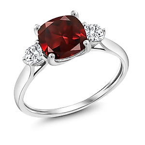 Gem Stone King 10K White Gold Red Garnet and White Moissanite 3 Stone Engagement Ring For Women (2.11 Cttw, Cushion 7MM, Gemstone January Birthstone) (Size 5)