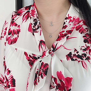 Dainty Four Leaf Clover and Celtic Trinity Knot Layered 1/20 Cttw Natural Diamond Pendant Necklace set in 925 Sterling Silver