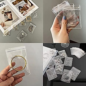 IKJNMLP Transparent Travel Earring Jewelry Bracelet Necklace Organizer Storage Book with Pockets - Large Clear Foldable Jewelry Organizer Bag Pouch Earring Stud Organizer Binder