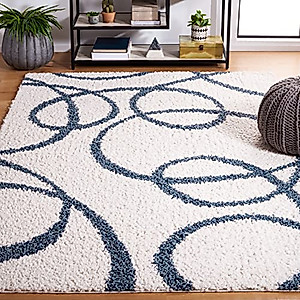 SAFAVIEH Calico Shag Collection Area Rug - 5'3" x 7'6", Ivory & Blue, Modern Abstract Design, Non-Shedding & Easy Care, 1.6-inch Thick Ideal for High Traffic Areas in Living Room, Bedroom (CLC118A)