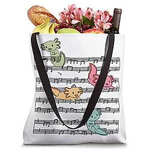Cute Axolotl Plays With Music Notes On Music Sheet Tote Bag