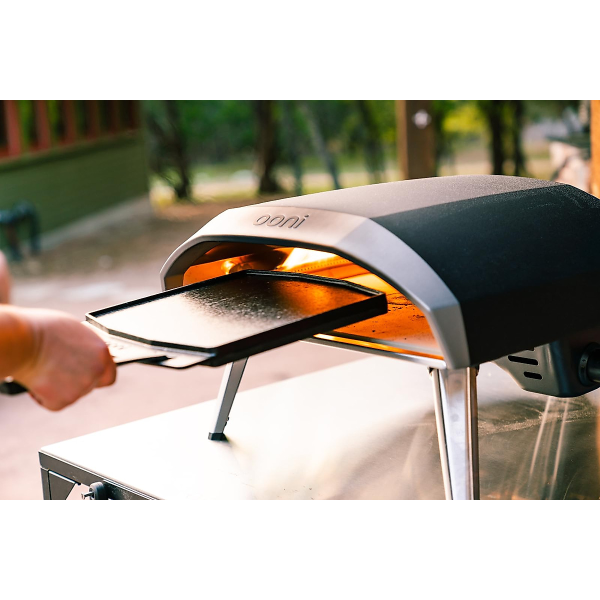 Ooni Cast Iron Dual-Sided Grizzler Plate - 37 x 33cm Reversible Griddle with Removable Handle and Stainless Steel Trivet, Pre-Seasoned Non-Stick Oven Safe Cookware, Pizza Oven and BBQ Accessories