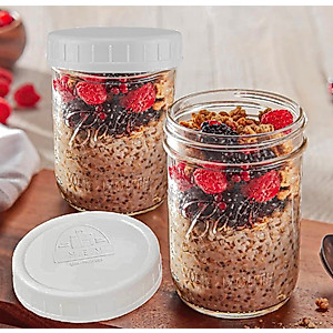 Wide Mouth Mason Jars 16 oz - (2 Pack) - Ball Wide Mouth 16-Ounces Pint Mason Jars with White M.E.M Food Storage Plastic Lids, Caps Fit Ball and Kerr Wide Mouth - For Storage, Freezing, Leak Proof,