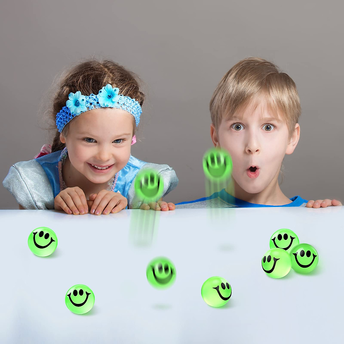 Chalyna 45 Pcs Glow in The Dark Smile Face Bouncing Balls Bulk 1 Inch Mini High Bounce Balls for Kids Teens Glowing Valentines Halloween Christmas Party Favors rubber Goodie Bag Fillers for Boys Girls