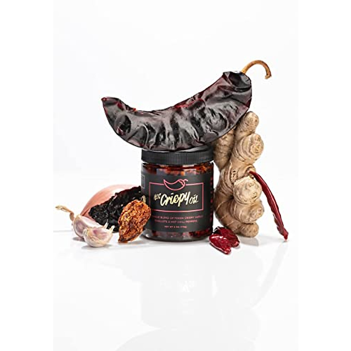 Hot Crispy Oil, An all natural unique blend of fresh fried shallots, fresh garlic and a proprietary blend of three different chili peppers. Highly addictive.