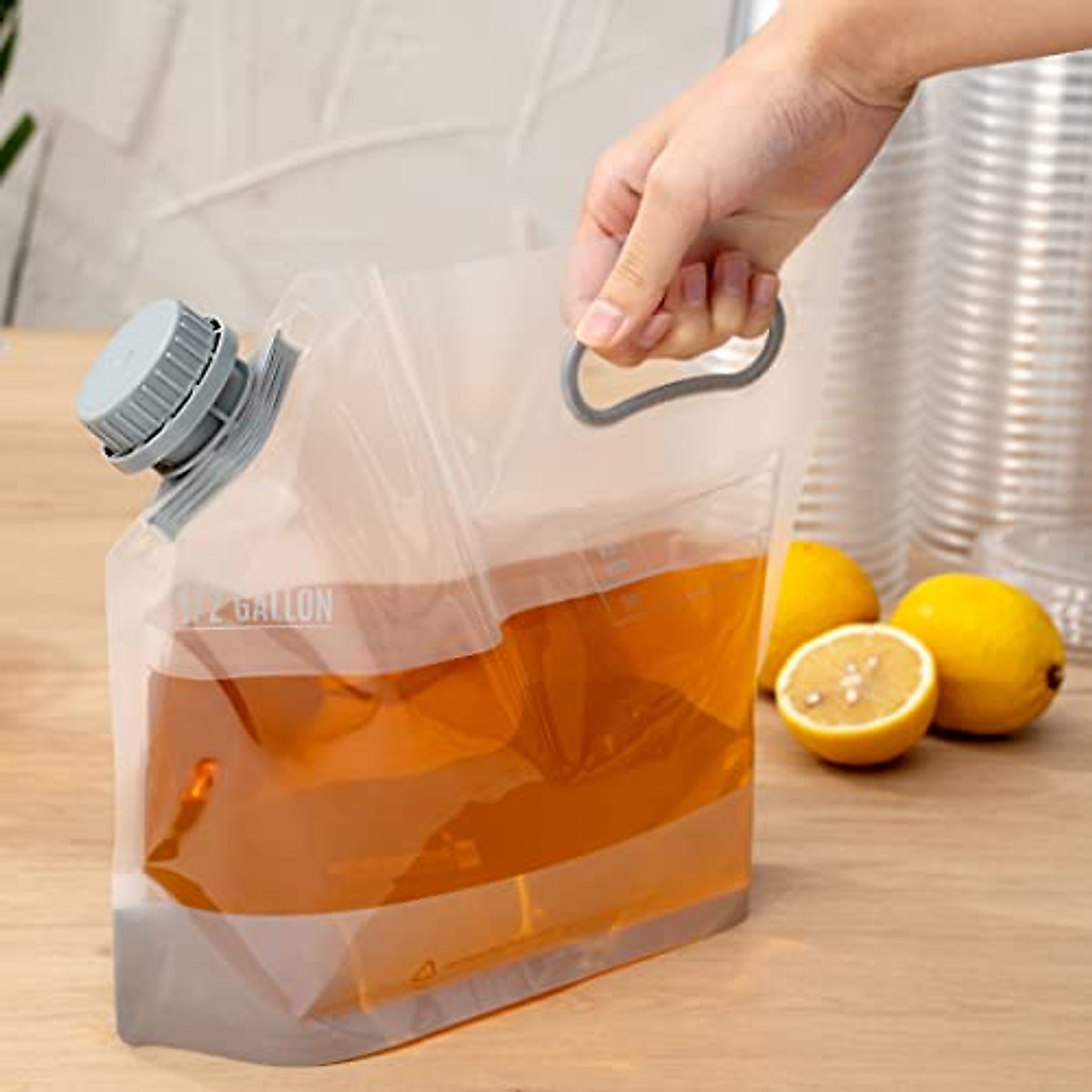 Restaurantware Cater Tek 1/2 Gallon Water Containers 10 Drink Bags - Collapsible Includes Tamper-Evident Caps Clear Plastic Beverage Bags For Catered Events Camping or Hiking Durable Handle