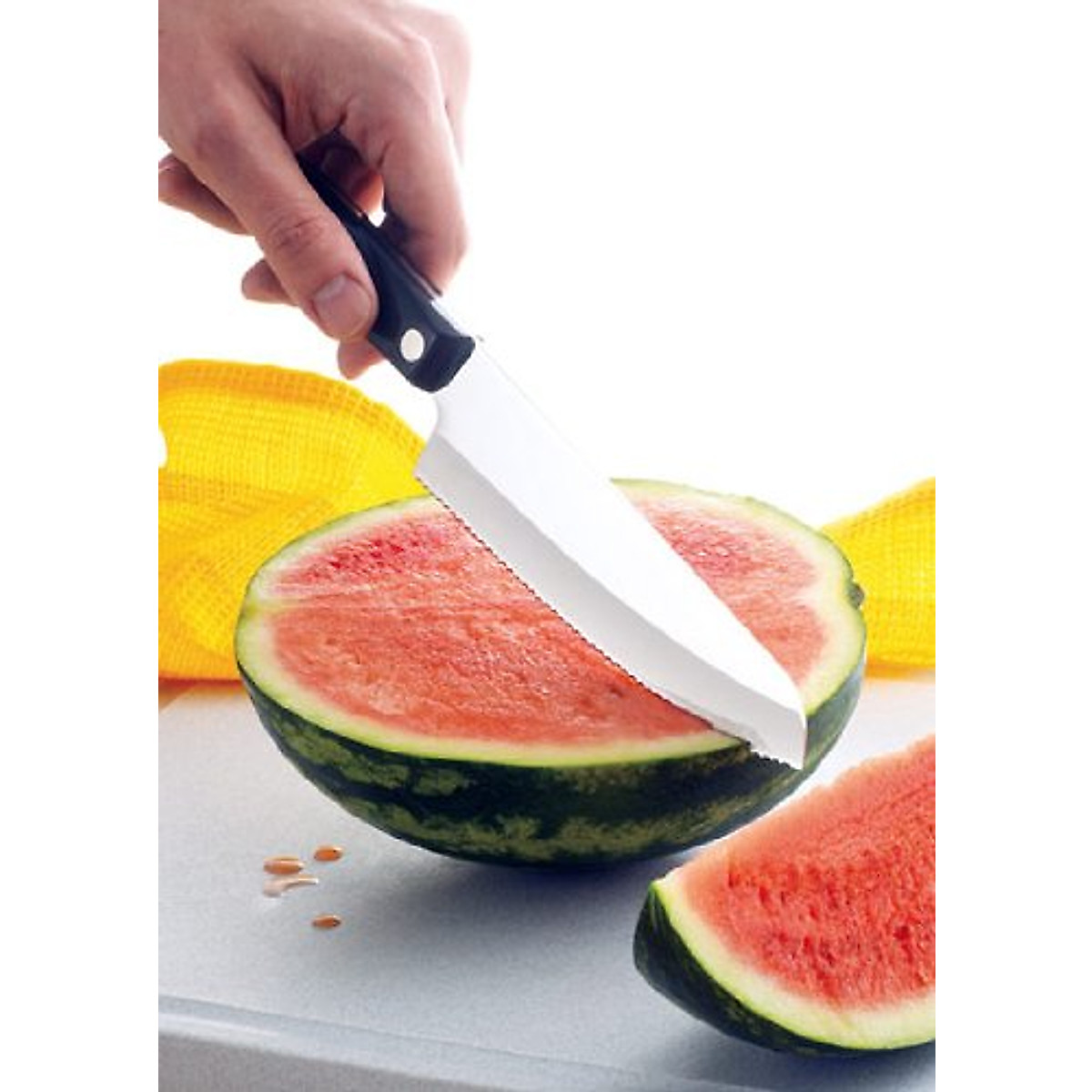 CUTCO Model 3738 Hardy Slicer.6.3" High-Carbon Stainless Double-D® serrated blade.5.7" Classic Brown handle (sometimes called black).In factory-sealed plastic bag.