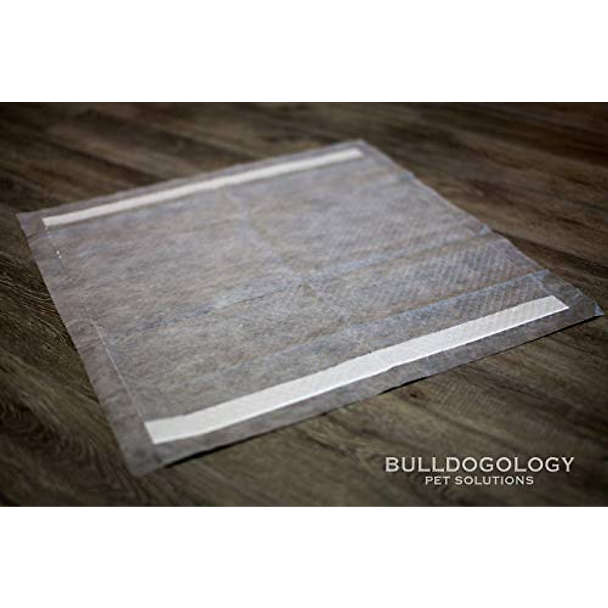 Bulldoglogy Carbon Black Puppy Pee Pads with Adhesive Sticky Tape - Large Charcoal Housebreaking Dog Training Wee Pads (24x24) 6 Layers with Extra Quick Dry Bullsorbent Polymer Tech (50-Count)