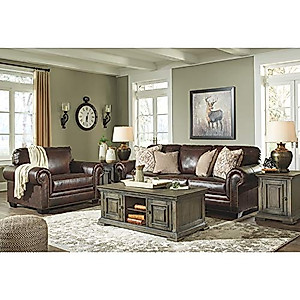 Signature Design by Ashley Roleson Traditional Leather Queen Sofa Sleeper with Nailhead Trim and 4 Accent Pillows, Brown