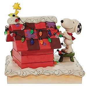 Enesco Peanuts by Jim Shore Snoopy and Woodstock Decorating The Dog House Figurine, 5.12 Inch, Multicolor