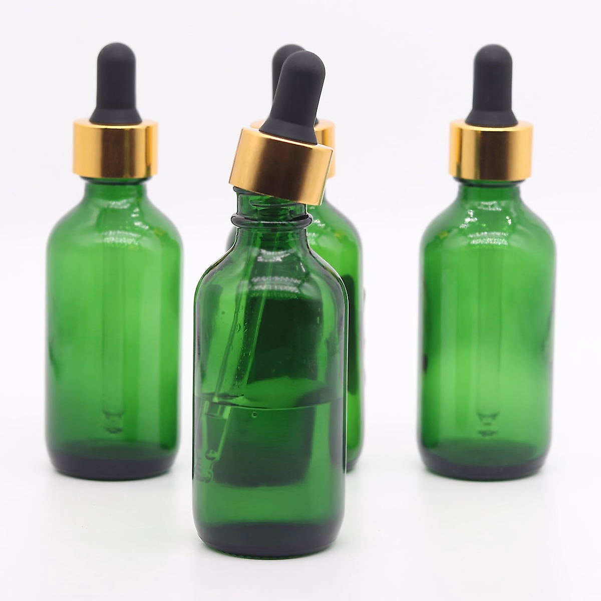 Toaazhy 4 pack,green glass dropper bottles 2 oz,60 ml dark empty tincture bottles with dropper,alcohol,hair oil bottle,eye,small,droppers for oils,medicine,pipette,drip drop,travel,perfume,essentia