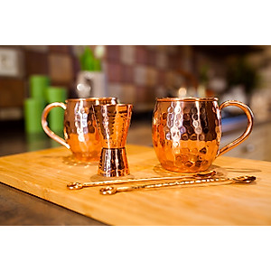 Copper jigger lacquered for the shine and to prevent tarnish. - Double 1oz/2oz copper measuring jigger for cocktail mixing. - Solid hammered copper 22G copper. - Copper shot glass for Moscow mule.