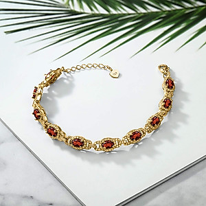 Gem Stone King 18K Yellow Gold Plated Silver Red Garnet Tennis Bracelet For Women (9.87 Cttw, Gemstone Birthstone, Oval 6X4MM, 7 Inch With 1 Inch Extender)