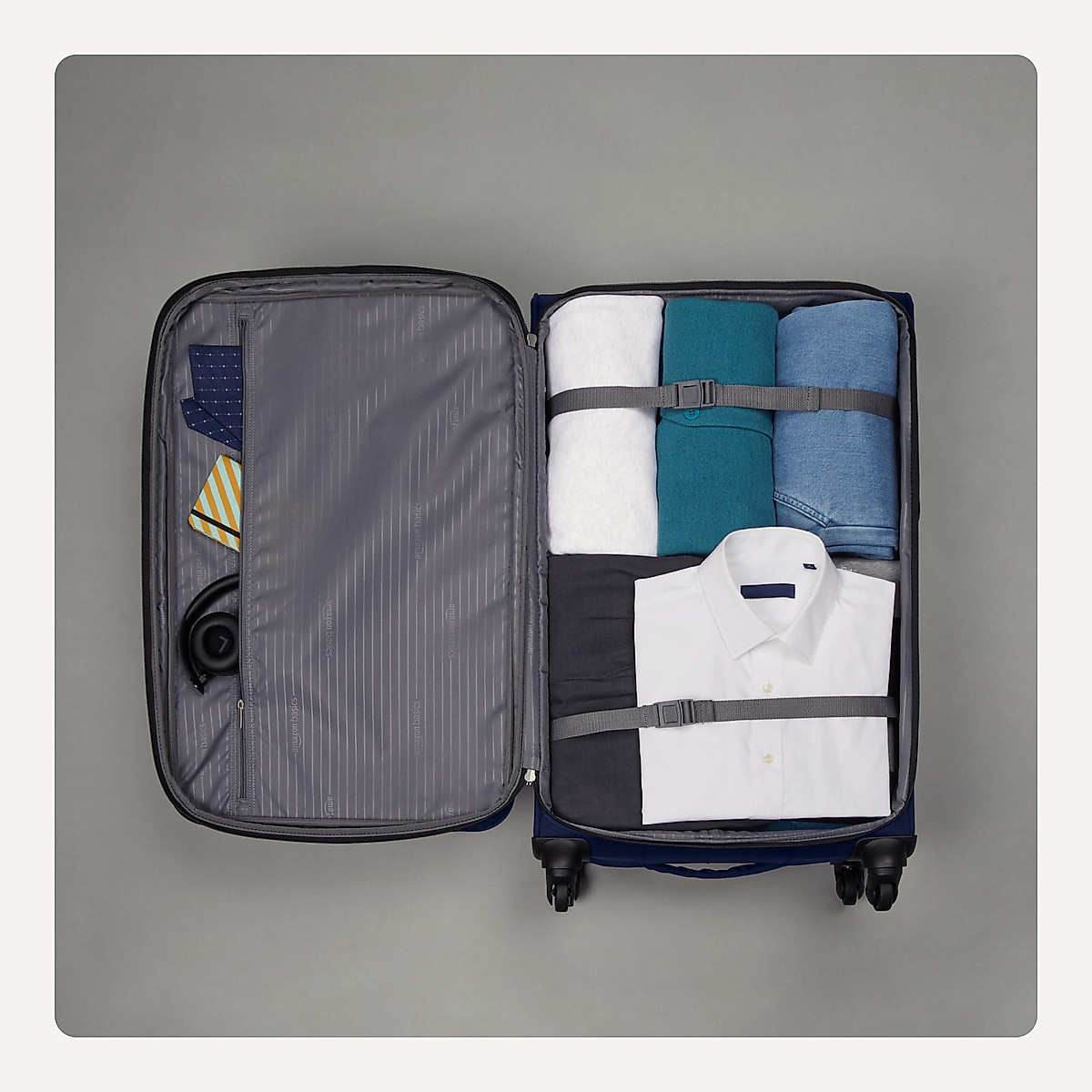 Amazon Basics Luggage, 30" Large Checked Softside Suitcase With Wheels With Four 360-Degree Multi-directional Spinner Wheels Expandable Space Zippered Pocket and Straps, Telescopic Handle, Navy Blue