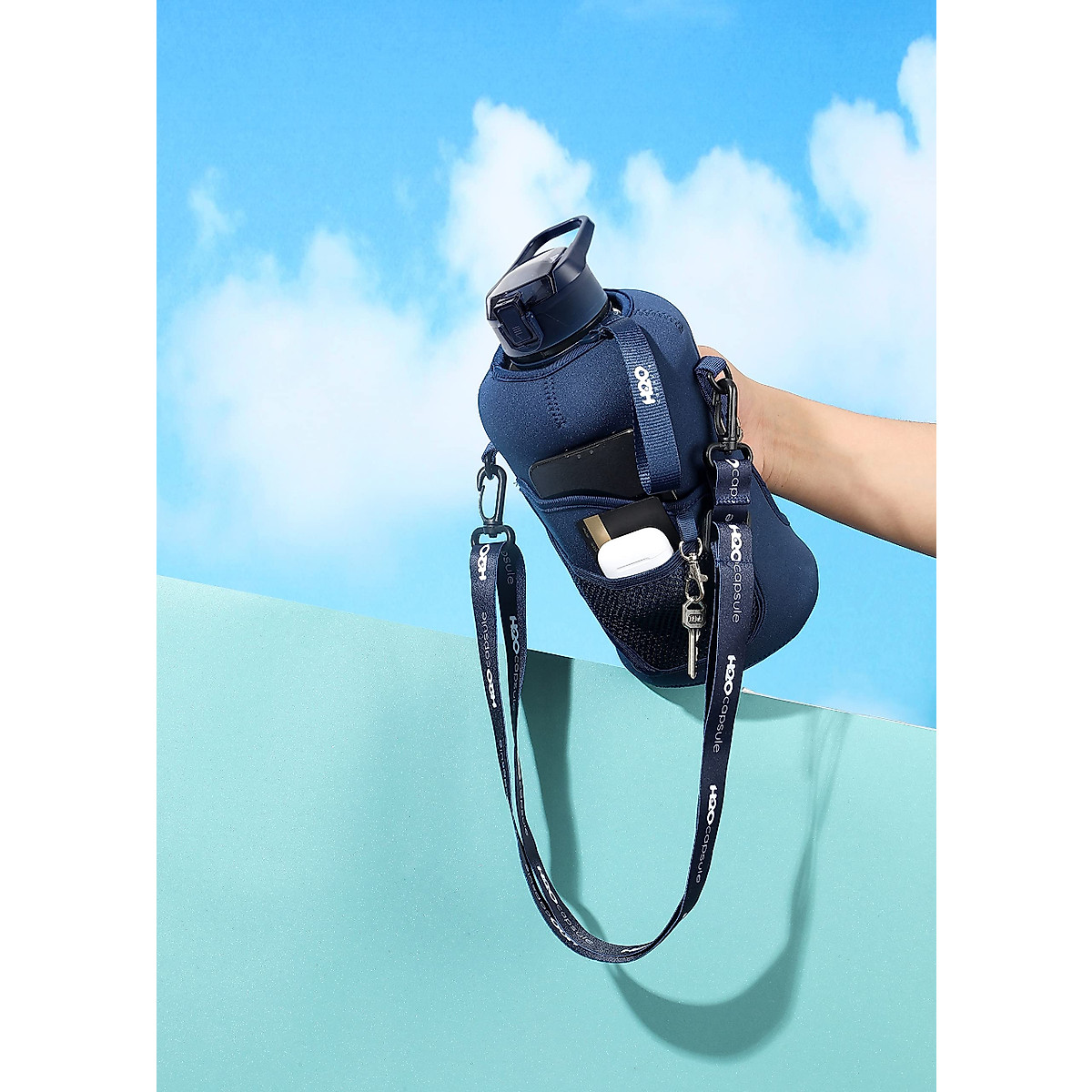 H2O Capsule 2.2L Half Gallon Water Bottle with Storage Sleeve and Removable Straw – BPA Free Large Reusable Drink Container with Handle - Big Sports Jug, 2.2 Liter (74 Ounce), Navy Blue