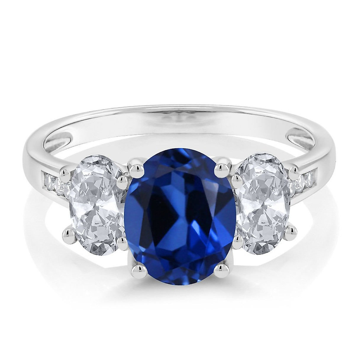 Gem Stone King 10K White Gold Blue Created Sapphire White Topaz and White Diamond Oval 3-Stone Engagement Ring For Women (2.60 Cttw, Gemstone September Birthstone, Available In Size 5, 6, 7, 8, 9)